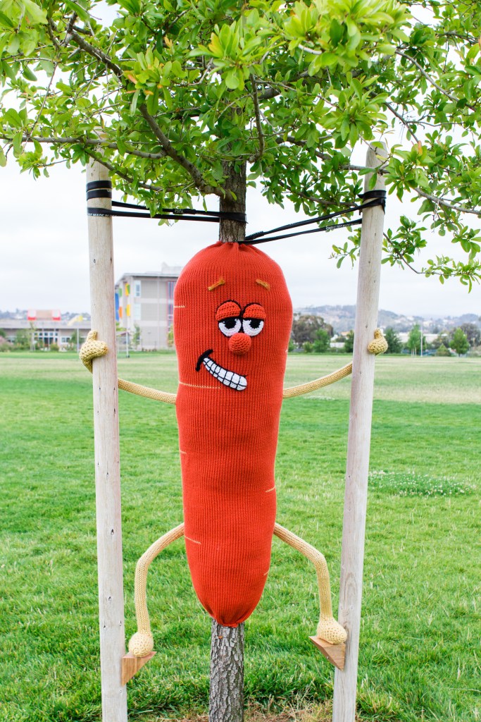 Rooty the Stilt-Walking Carrot Yarnbomb | KNITS FOR LIFE